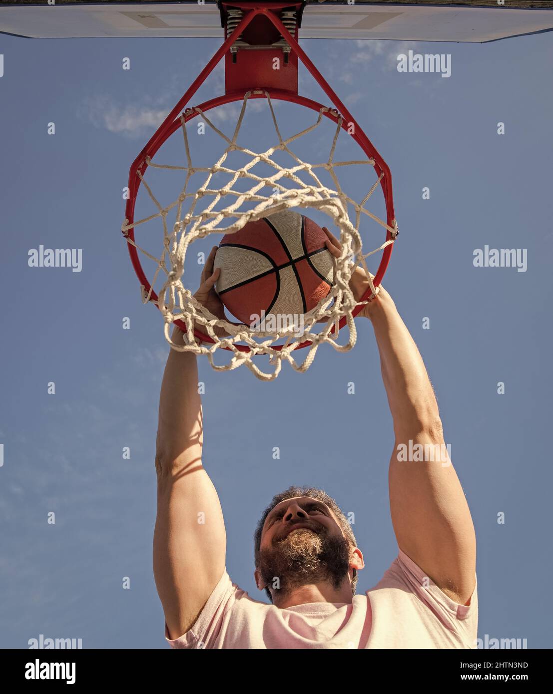 sport and hobby. dunk in basket. slam dunk in motion. summer activity ...