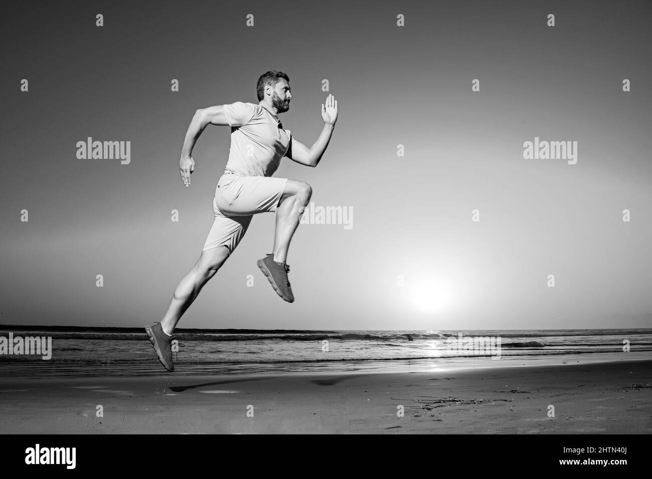 Athletic young man running. Healthy lifestyle concept. Dynamic jumping ...