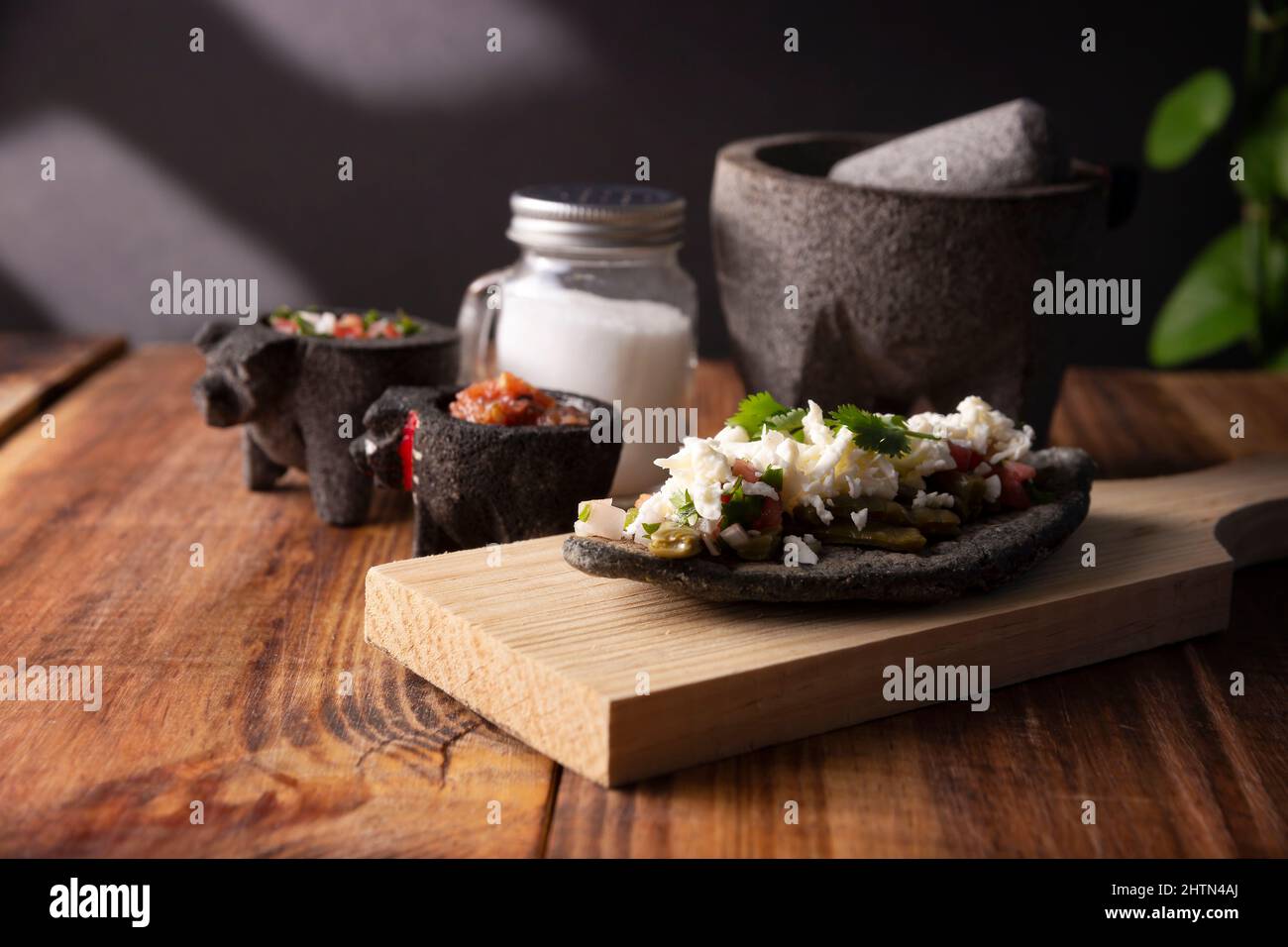 Tlacoyo with Nopales and salsa. Mexican pre hispanic dish made of blue ...