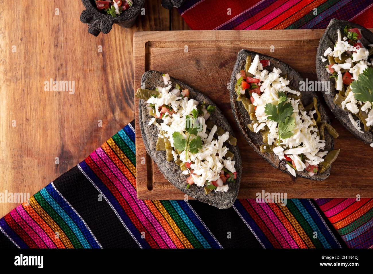 Tlacoyos. Mexican pre hispanic dish made of blue corn flour patty ...