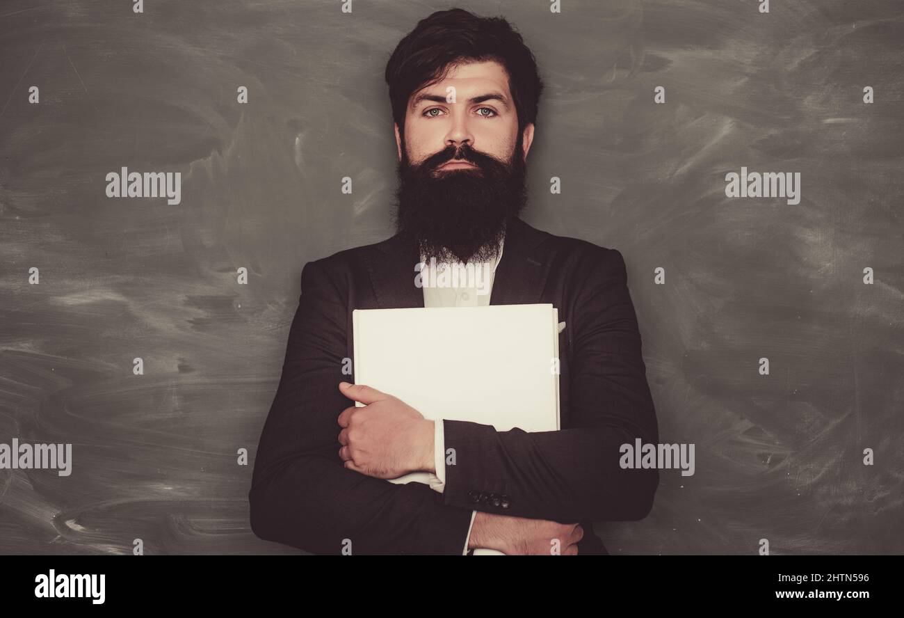 Professor in class on blackboard background. Academic success is much ...