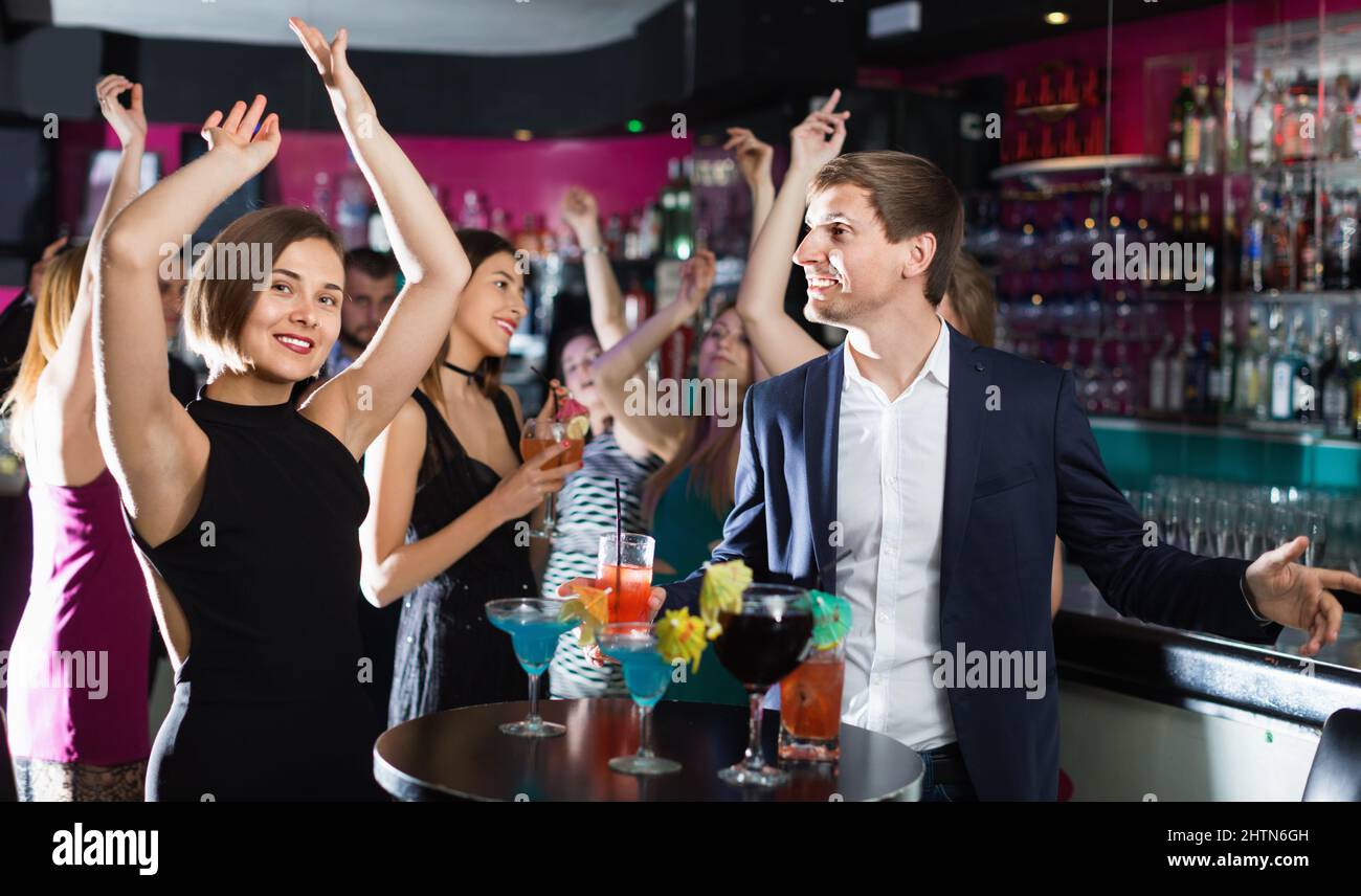 Positive colleagues dancing on hi-res stock photography and images - Alamy