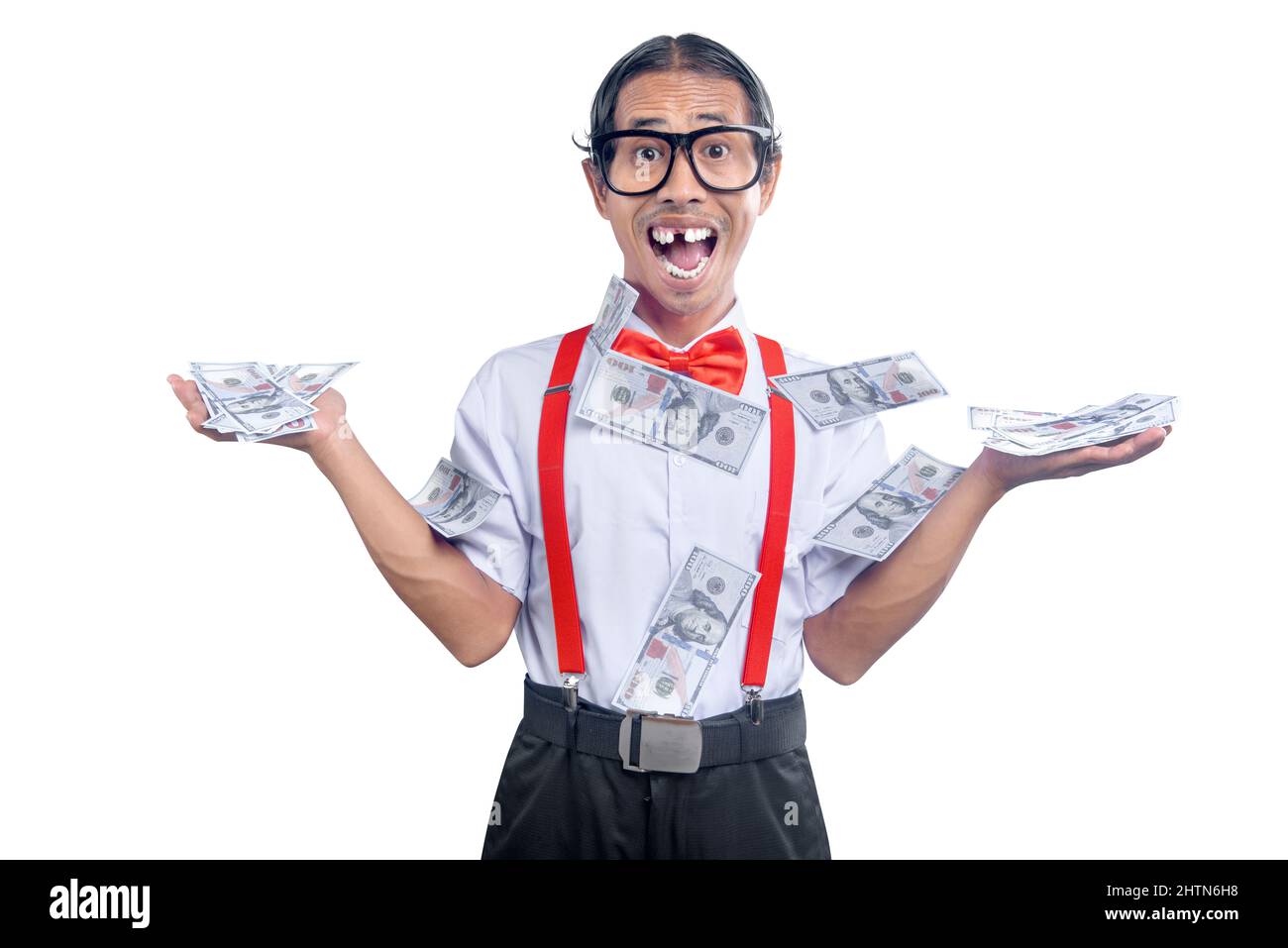 Asian nerd with an ugly face holding money isolated over white ...