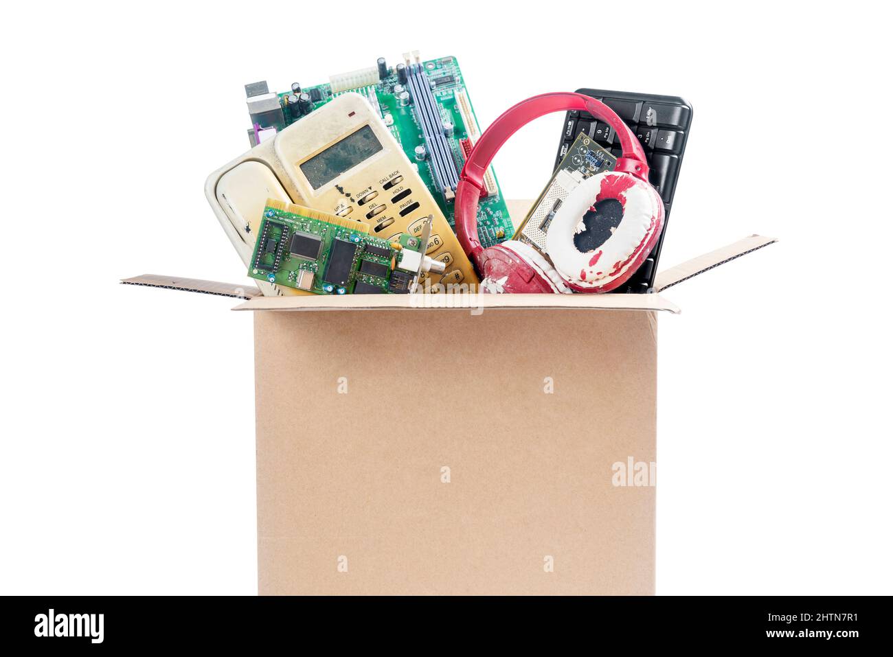 Box with discarded stuff isolated over white background Stock Photo - Alamy