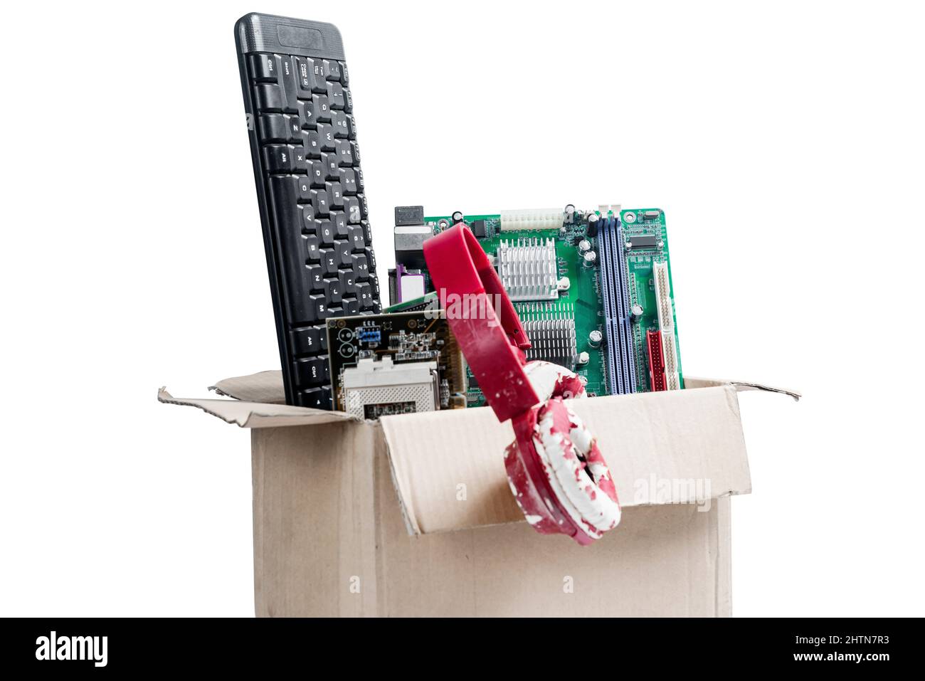 Box with discarded stuff isolated over white background Stock Photo - Alamy