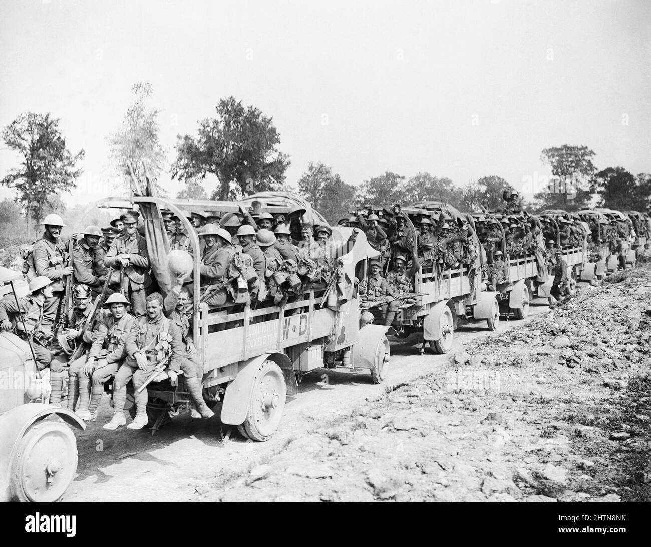Column of lorries with men of the 16th Irish Division (probably mixture ...
