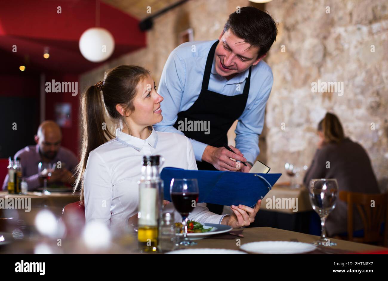 Woman taking order from hi-res stock photography and images - Alamy