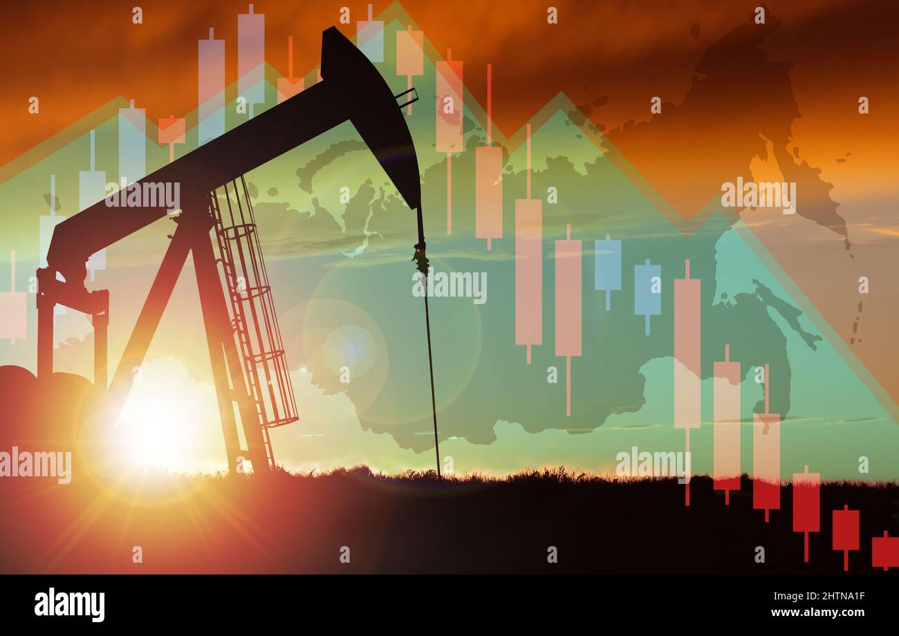 Pump jack silhouette against a sunset sky with Russian map and ...