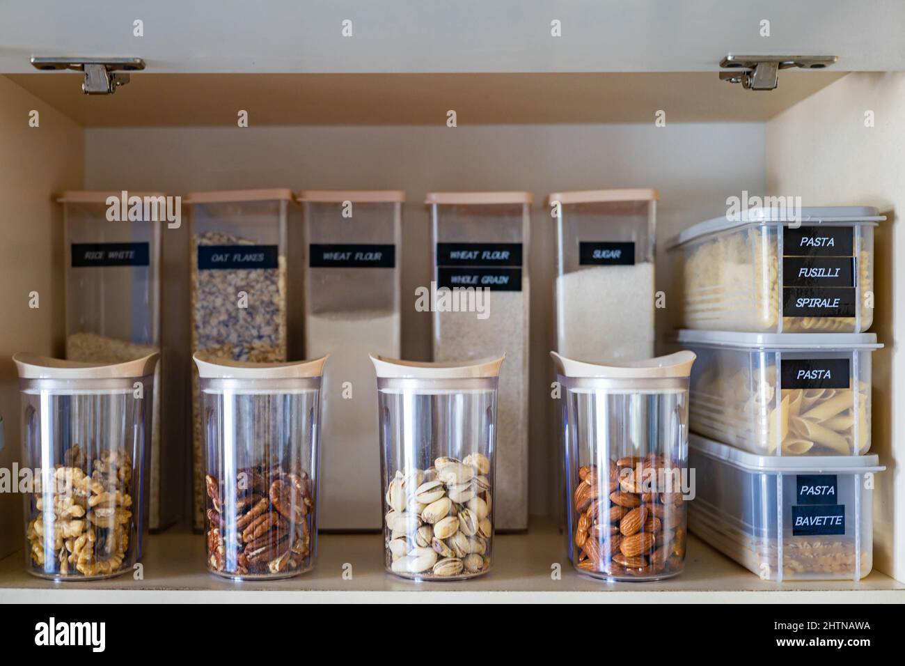 Domestic healthy vegetarian dry food storage organization on shelf at ...