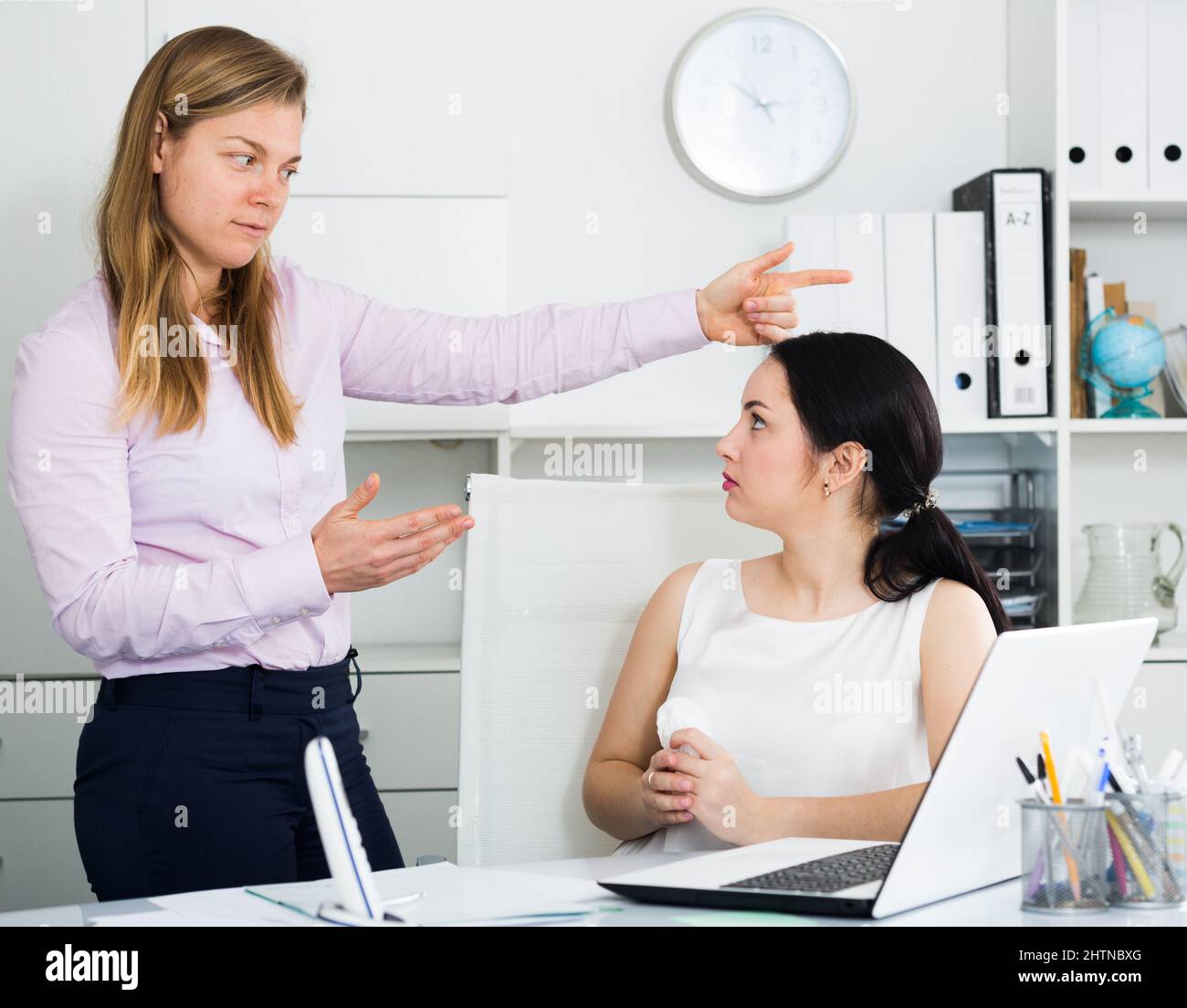 Conflict in office Stock Photo - Alamy