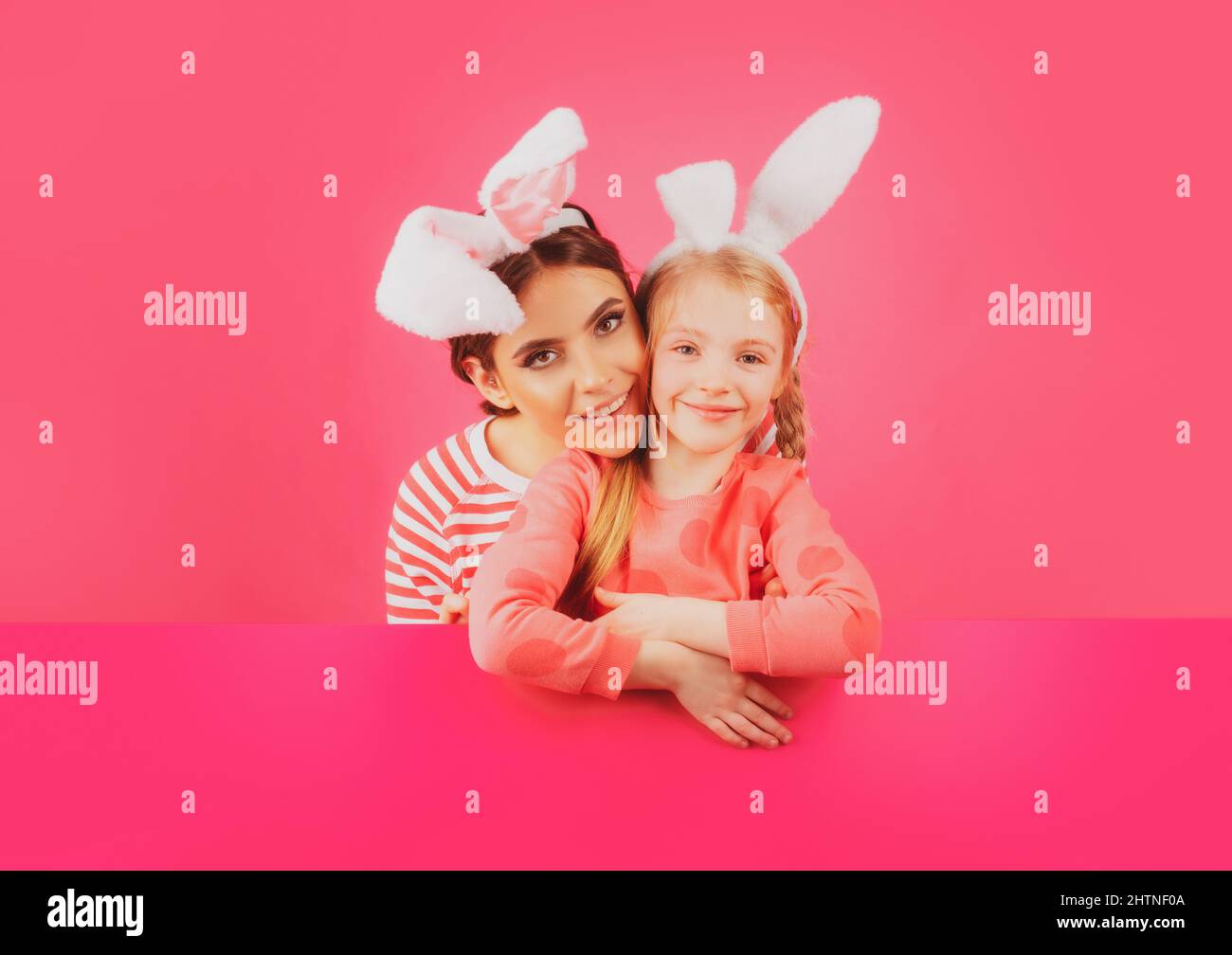 Happy girls with bunny ears. Little sister celebrate easter. Egg hunt ...