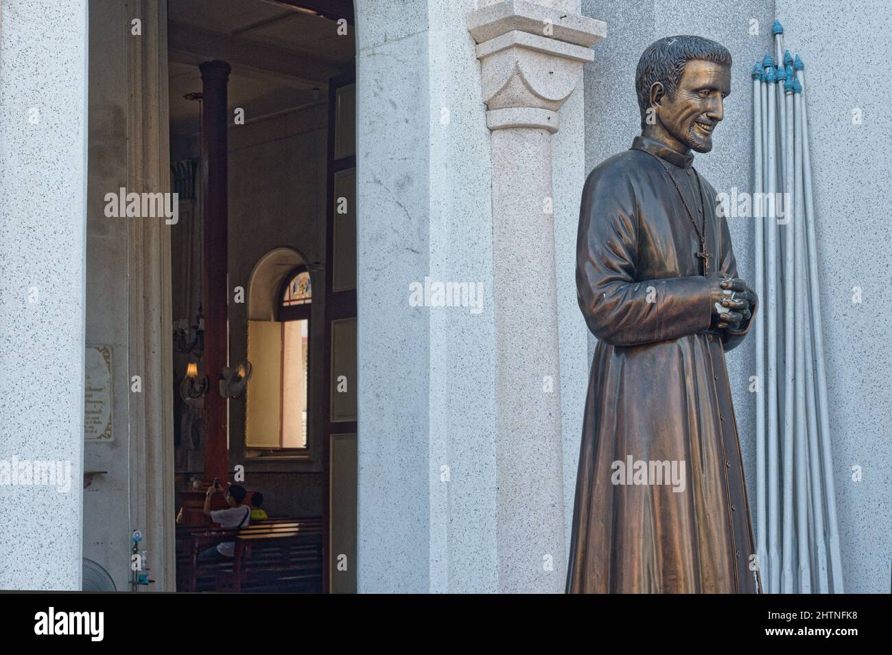 Statue of a former French priest at Immaculate Conception Church ...