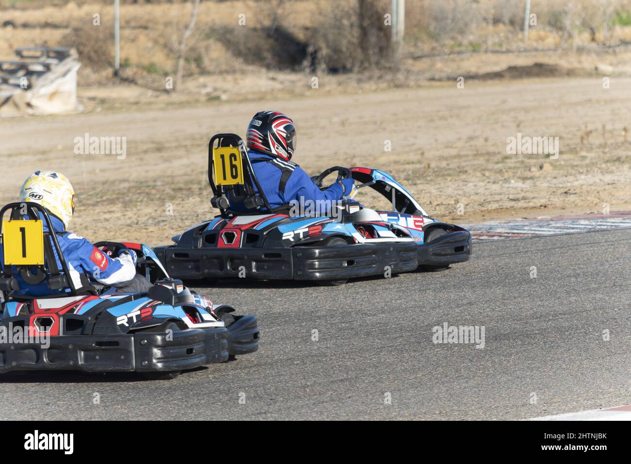 Closeup of a Man racing Go-cart on karting circuit in Toledo, Spain ...
