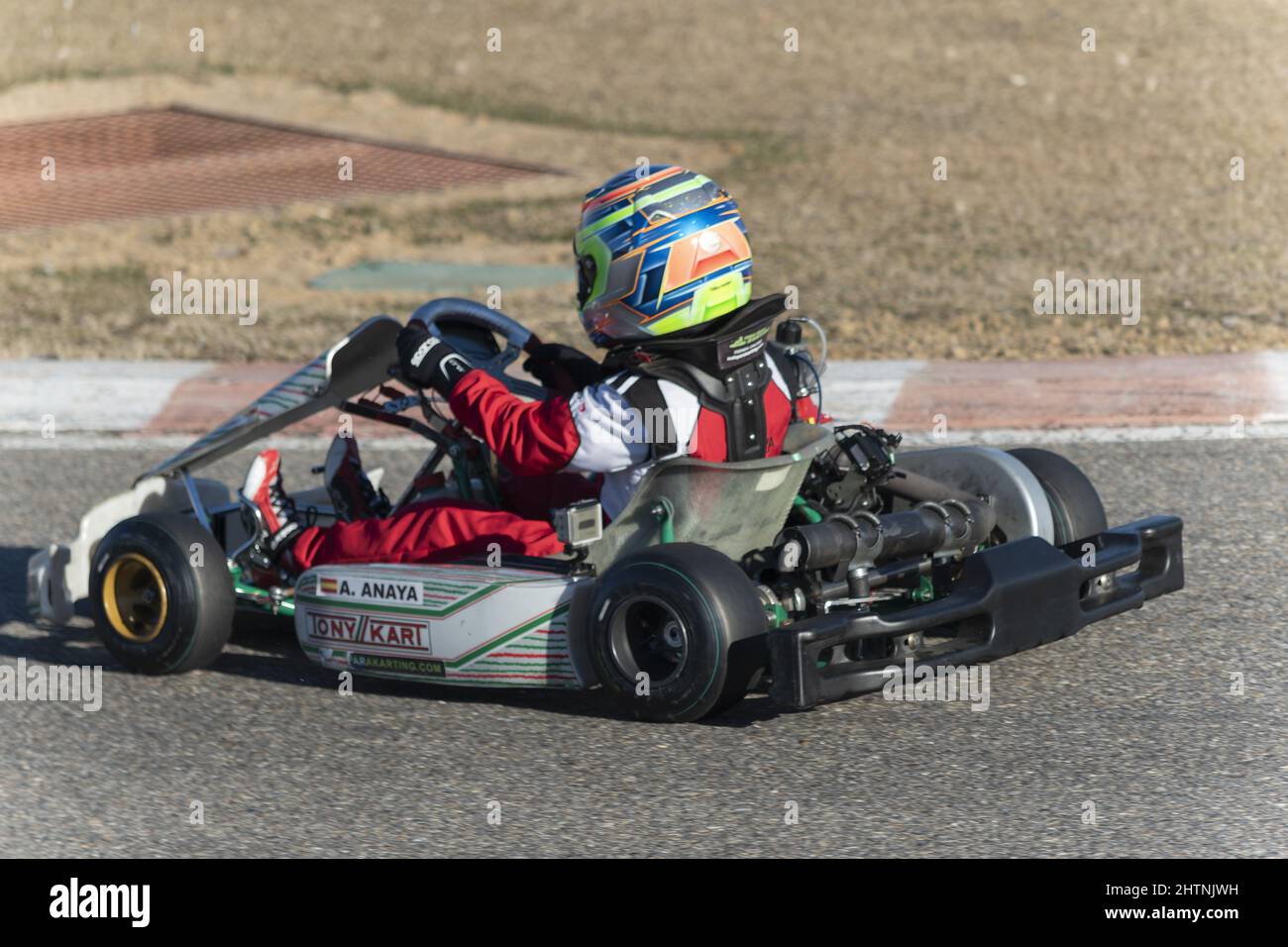 Man racing go-kart on a karting track Stock Photo - Alamy