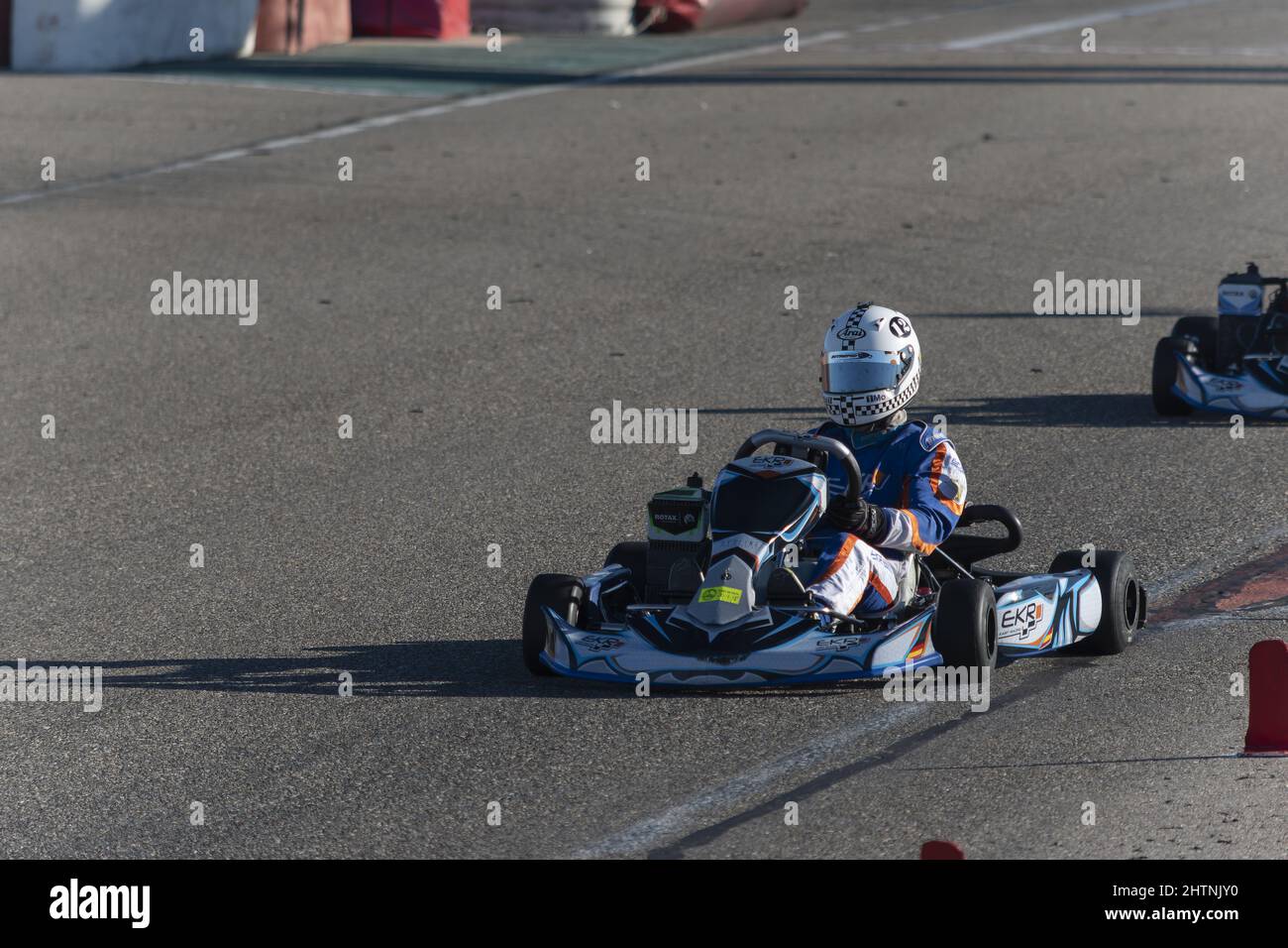 Man racing go-kart on a karting track Stock Photo - Alamy
