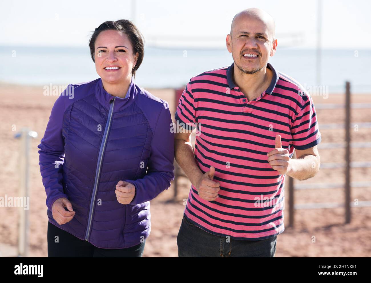 Couple jogging together outdoor Stock Photo - Alamy
