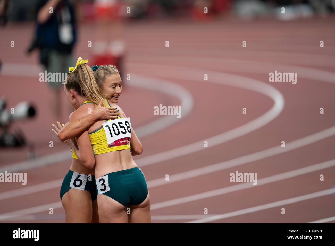 Jessica Hull hugging a friend at the finish line in the 1500 meters at ...