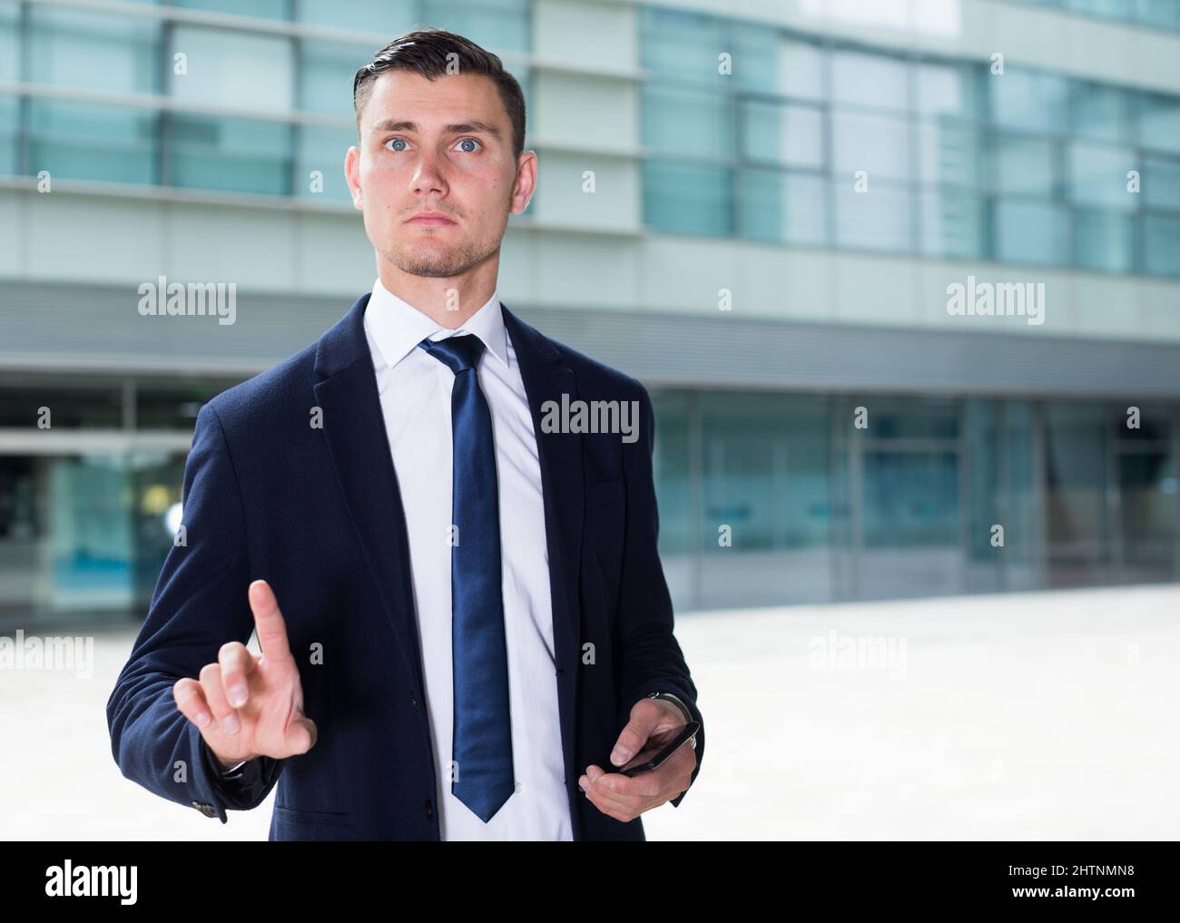 Male is asking companion to wait Stock Photo - Alamy