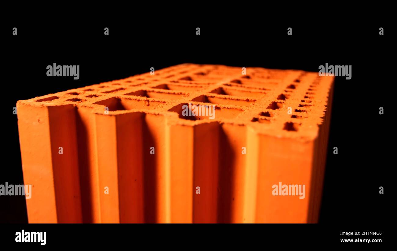 Abstract animation of 3d orange brick surface on the black background ...
