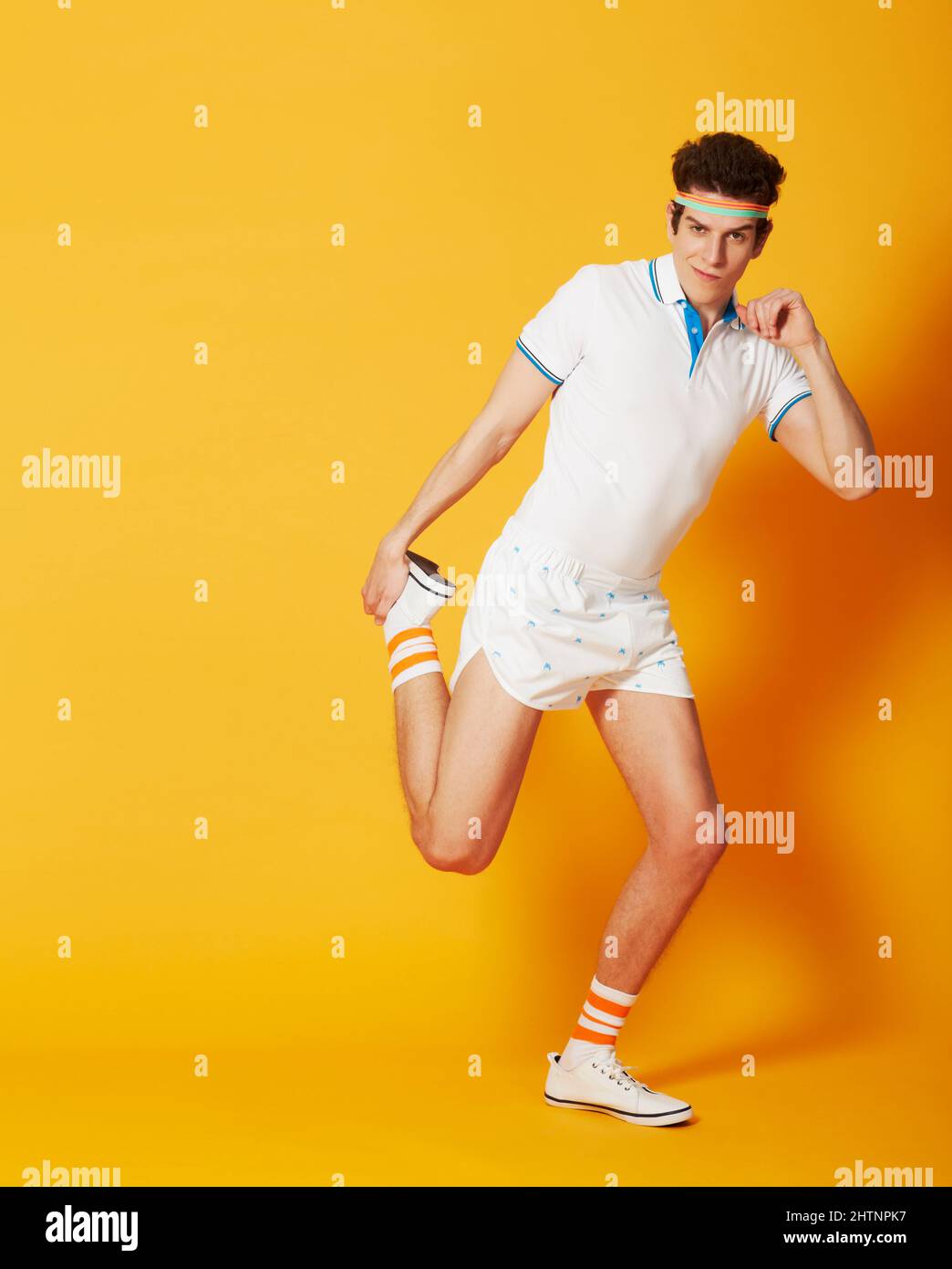 Man stretches muscles doing sports hi-res stock photography and images ...