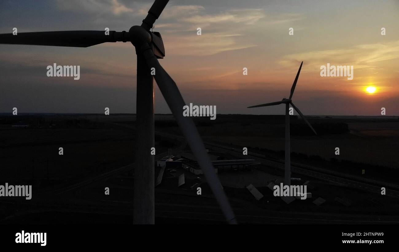 Wind turbines that produce environmentally friendly energy Stock Photo ...