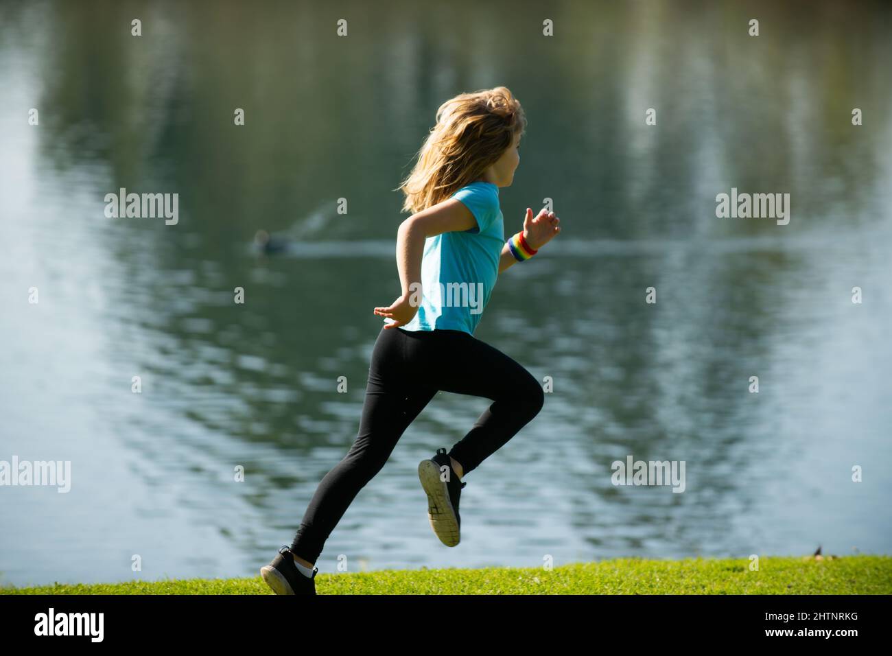 Kids jogging in park outdoor. Little boy running in nature. Active ...