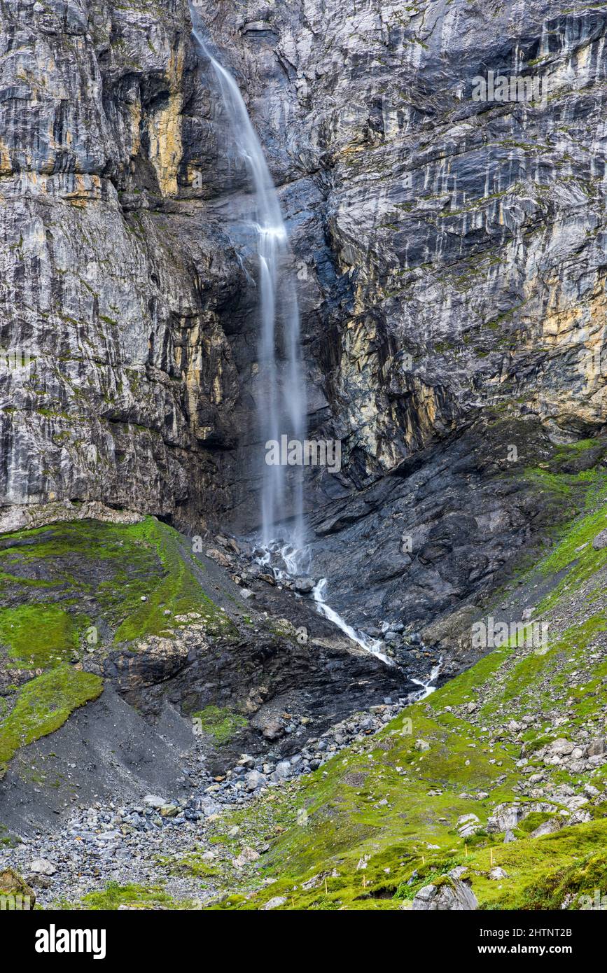 Typical alpine landscape with waterfalls, Swiss Alps near ...