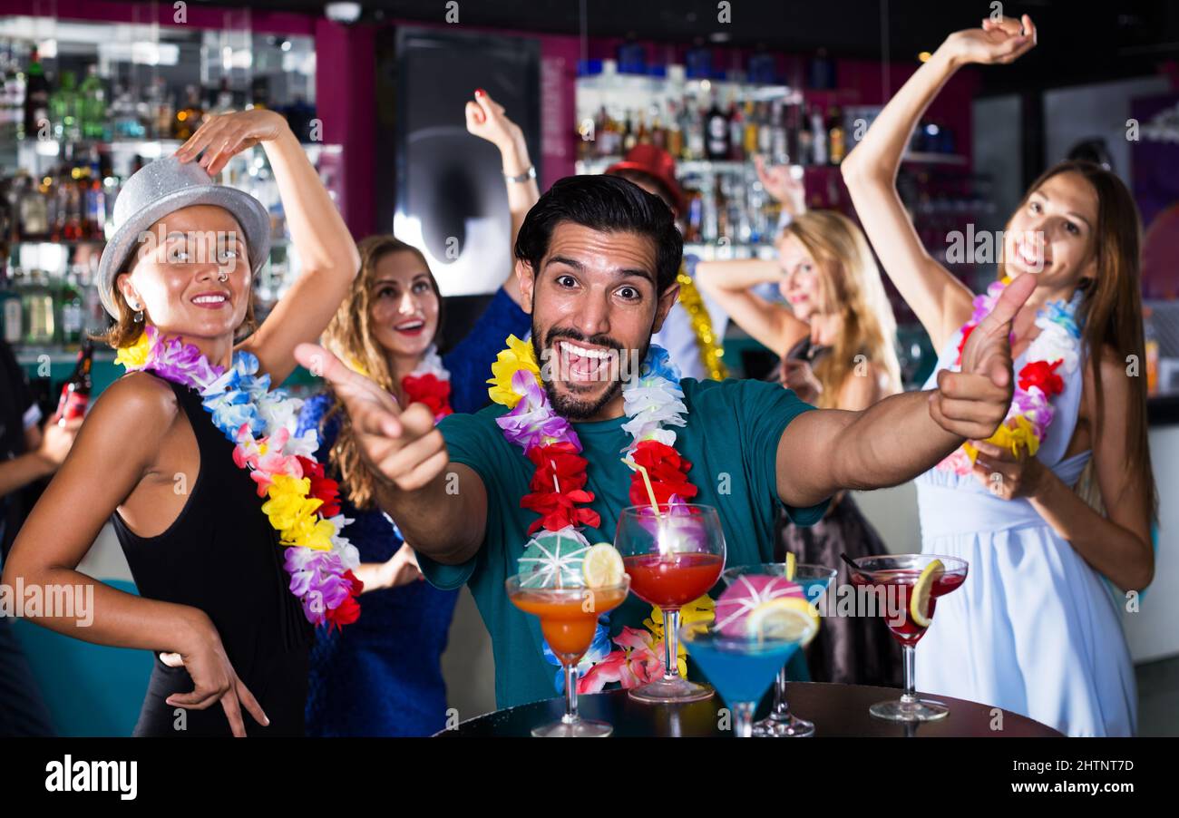 Man dancing on hawaiian party Stock Photo - Alamy