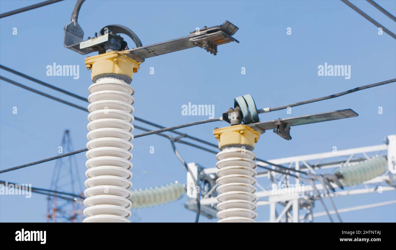 Power poles on background of blue sky. Action. Beautiful electric poles ...