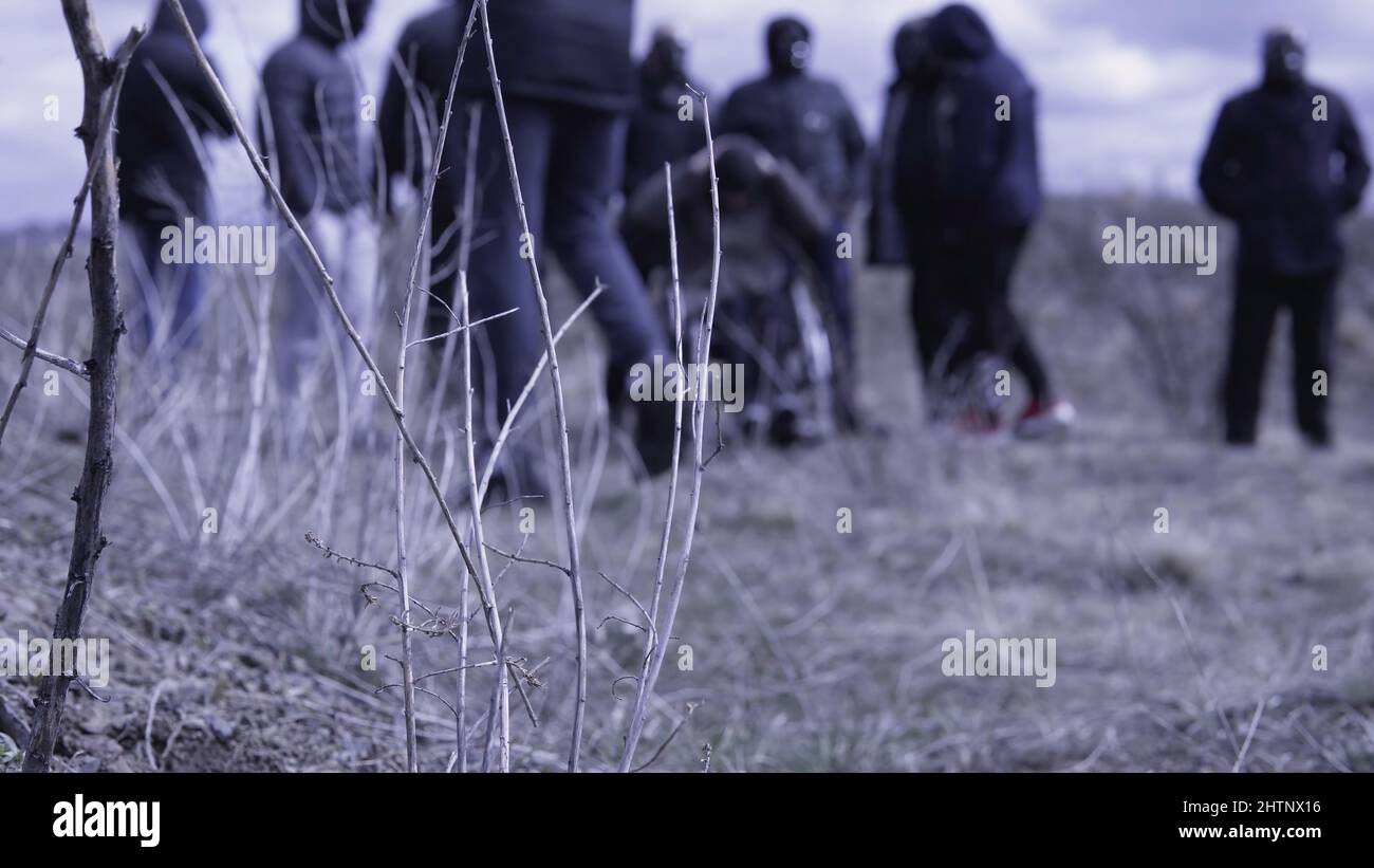 Meeting of a criminal group in a clearing. Footage. Criminal people ...