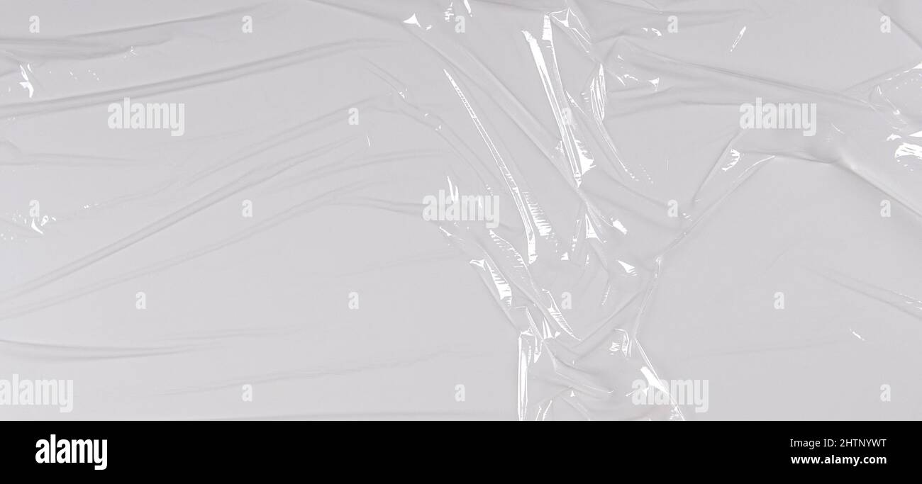 Transparent film cellophane background. White wrinkled stretched ...