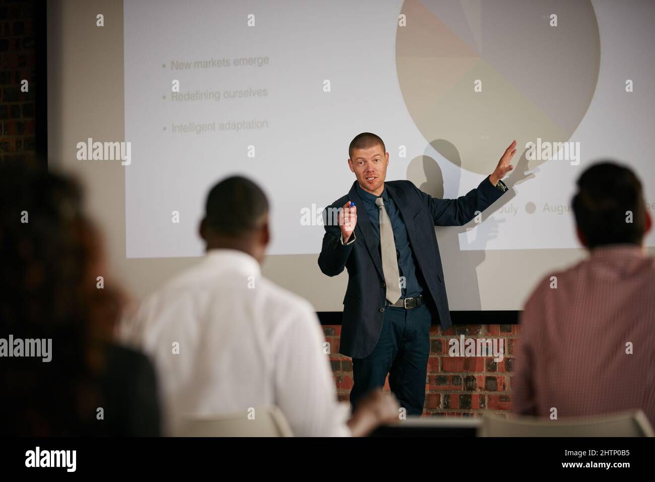 Presenting a great new idea for a business model. Shot of a businessman ...
