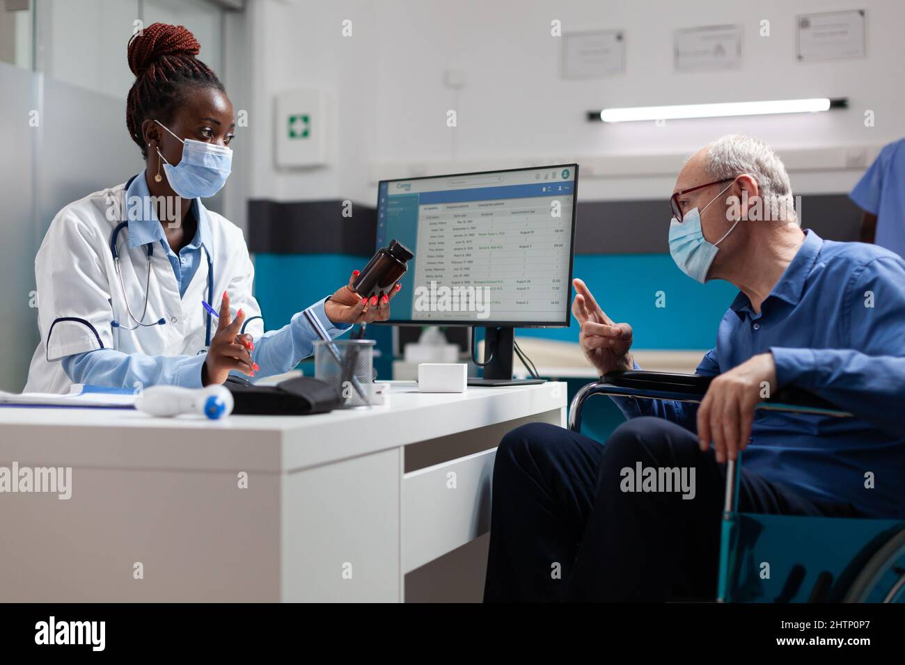 Physician doctor woman holding pills bottle explaining healthcare ... Physician doctor woman holding pills bottle explaining healthcare ...