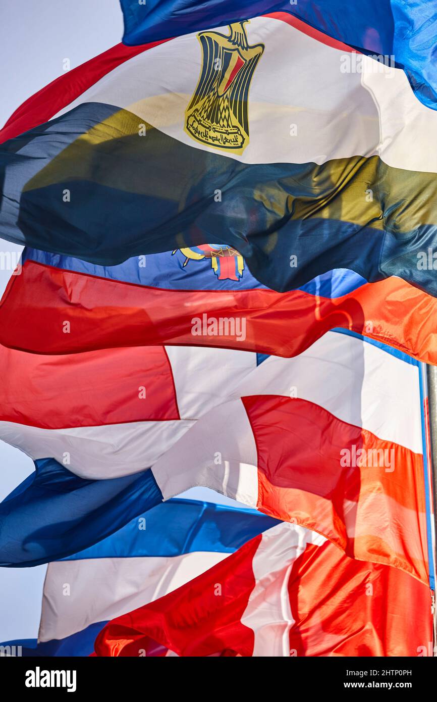 Flags of the word waving in the wind. Nation emblems Stock Photo - Alamy