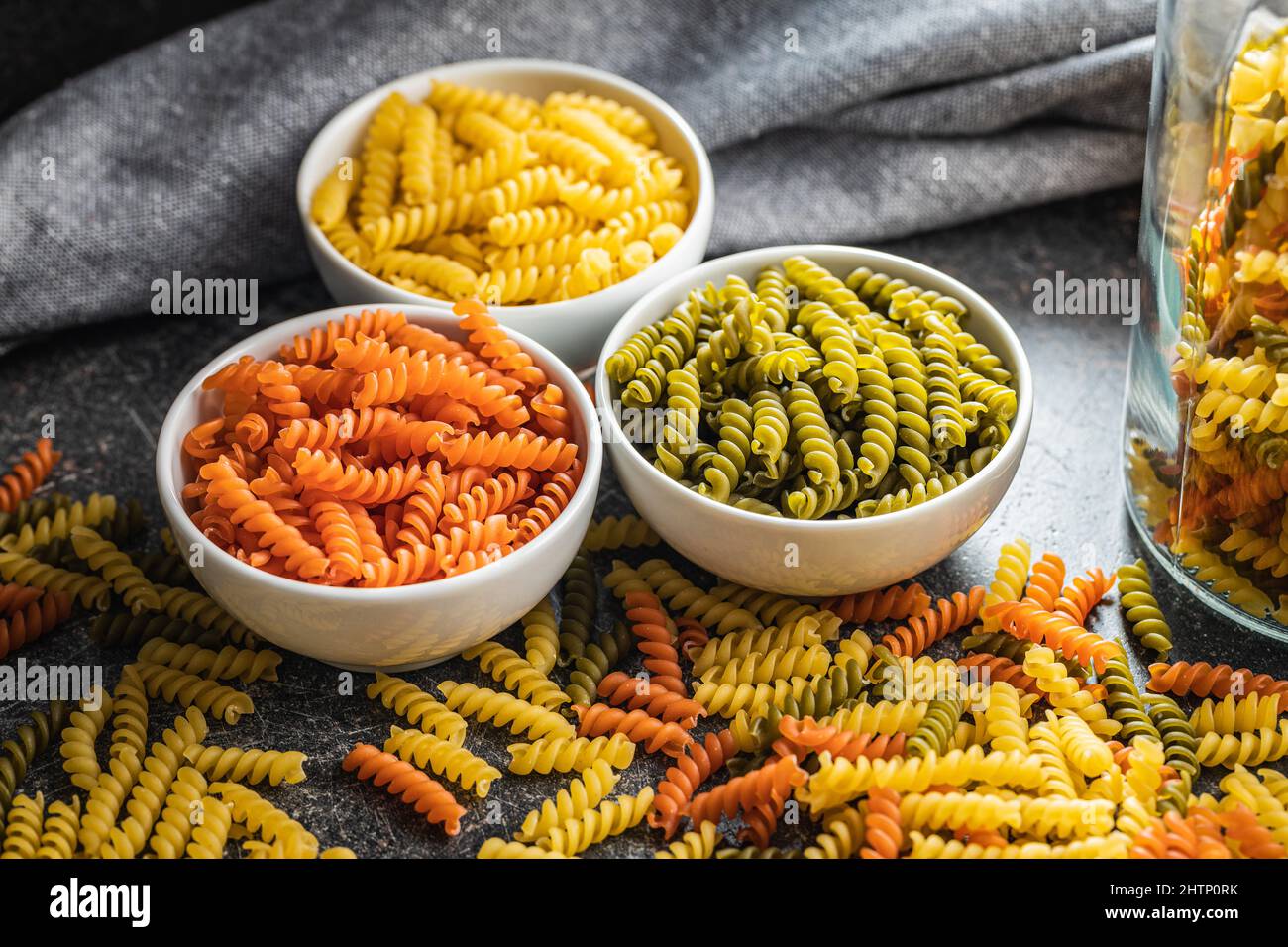 Three colors fusilli pasta. Colorful italian raw pasta in bowl Stock ...