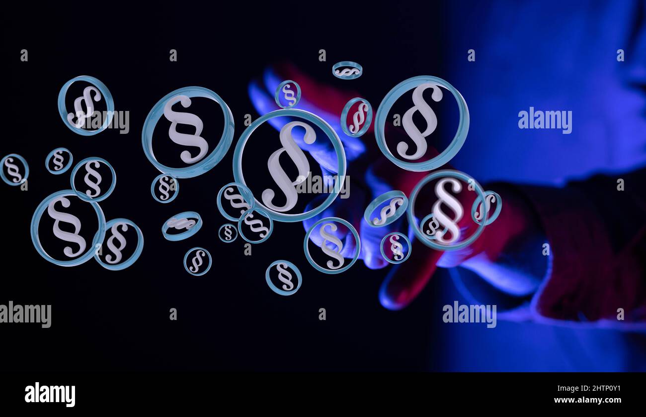 Hovering 3D justice and law sign on a man's hand Stock Photo - Alamy