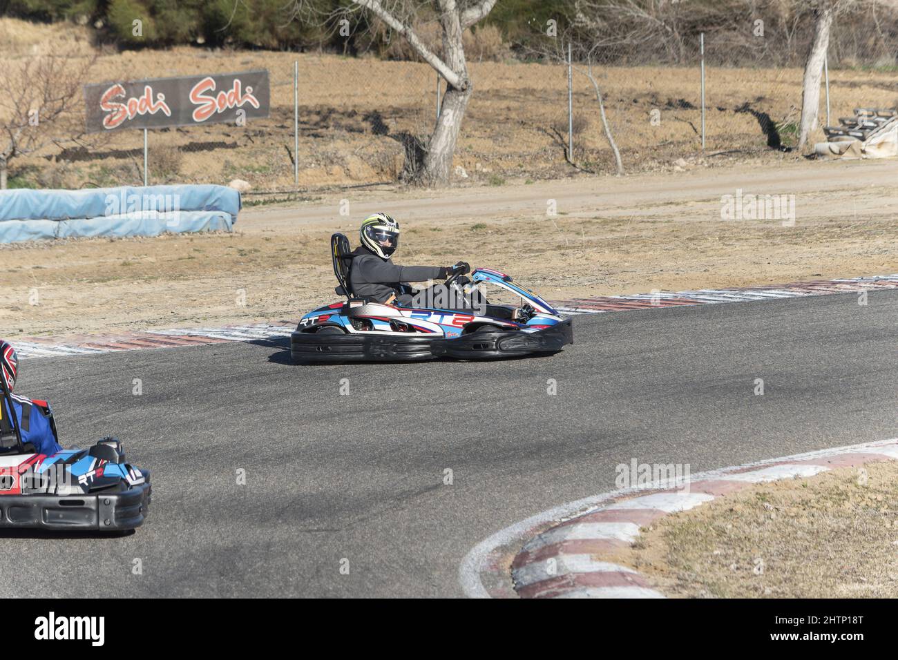 Closeup of a Man racing Go-cart on karting circuit Stock Photo - Alamy