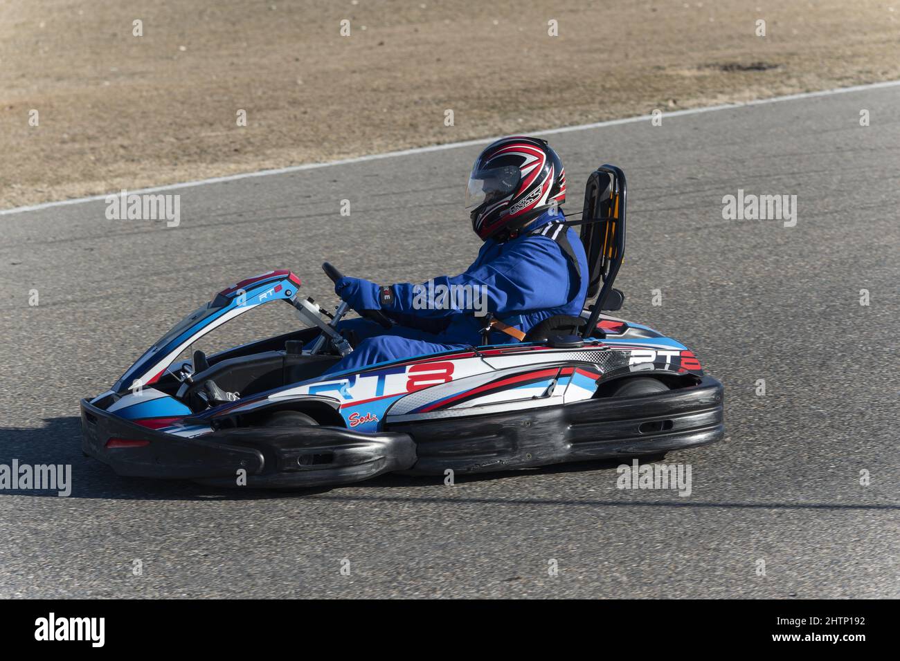 Closeup of a Man racing Go-cart on karting circuit Stock Photo - Alamy
