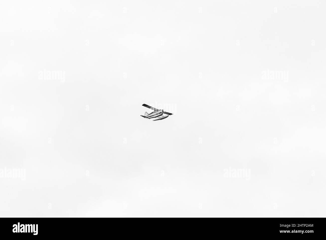 Aircraft flying in clouds Black and White Stock Photos & Images - Alamy