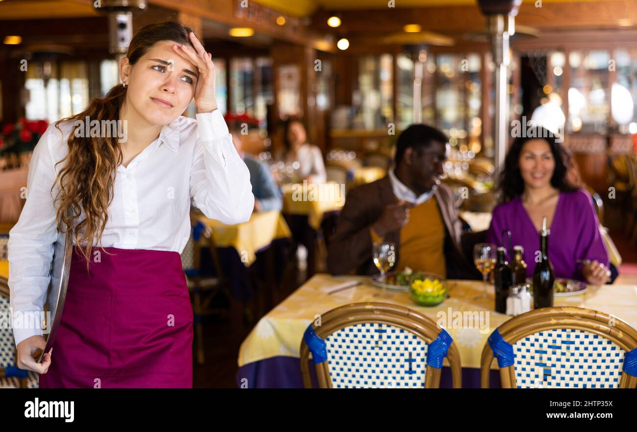 Exhausted waitress hi-res stock photography and images - Alamy