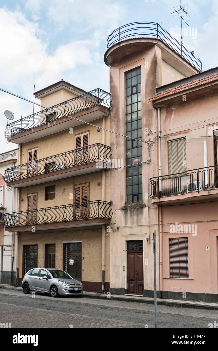 1930s apartment blocks in Mascali, Etna, Sicily, Italy. The town was ...