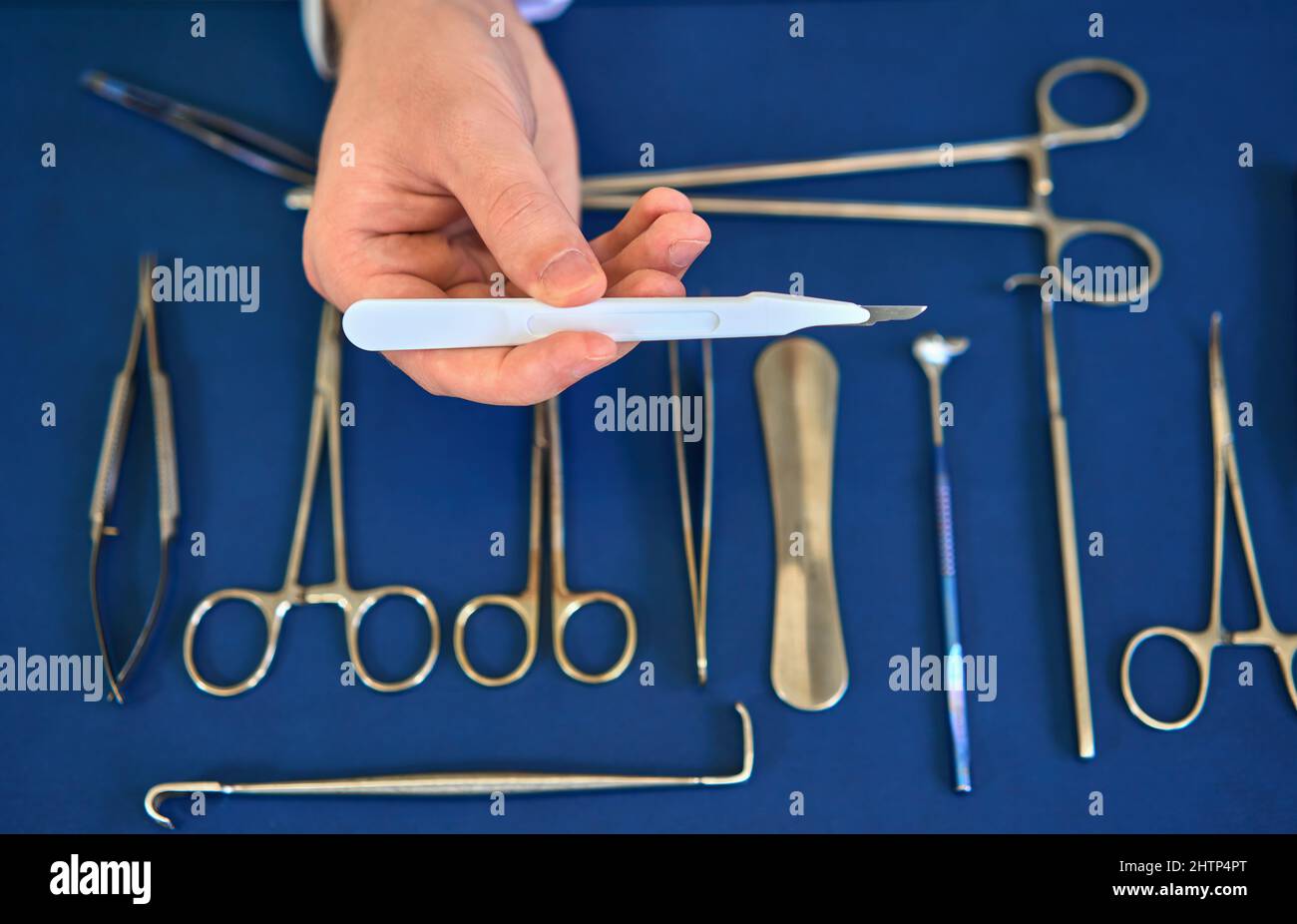 doctor holds surgical instruments in his hands Stock Photo - Alamy