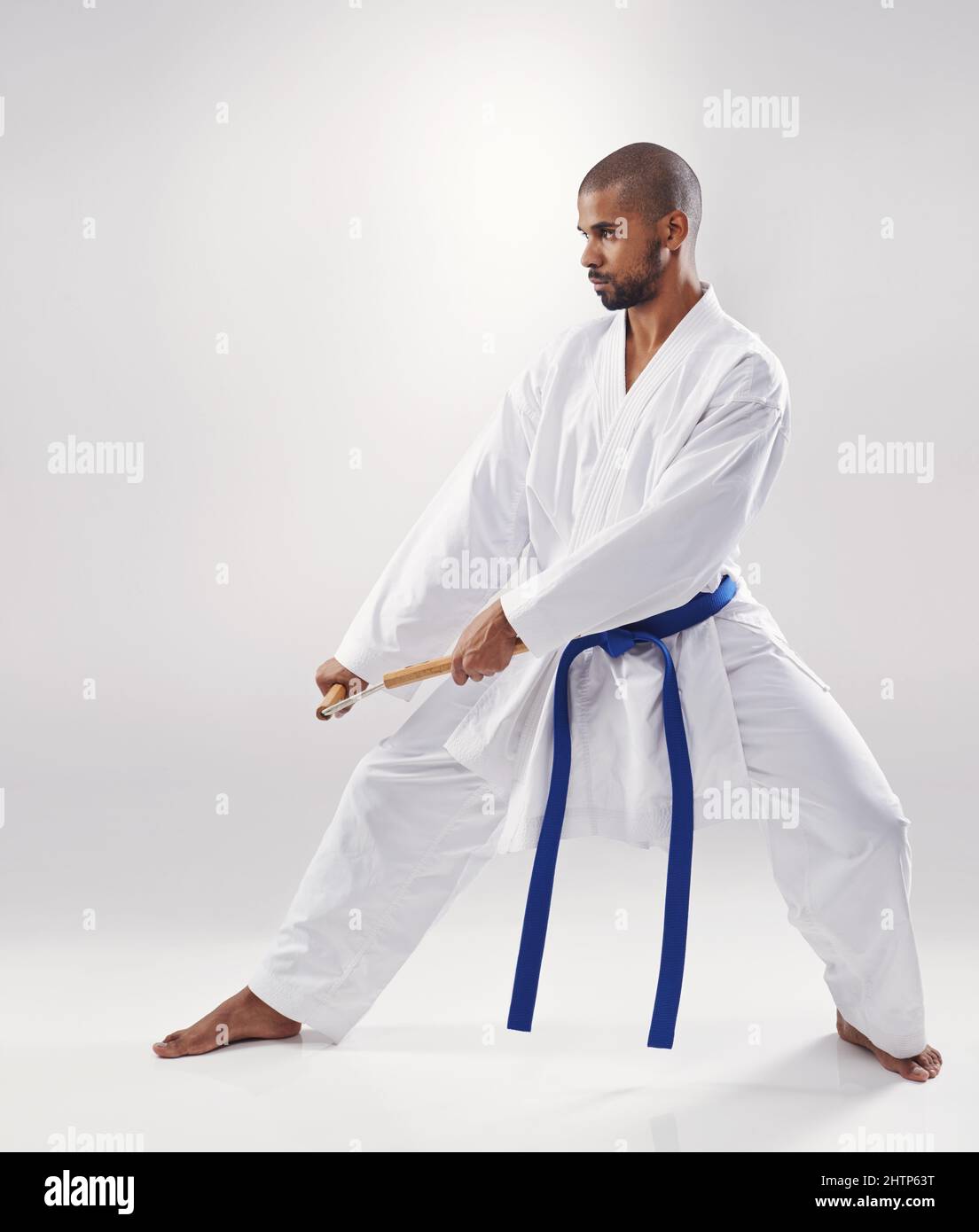 Hes a martial arts master. An african man doing karate Stock Photo - Alamy