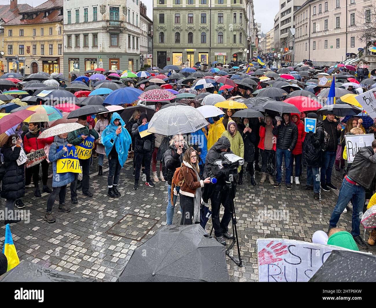 Unity march in Ljubljana against Russian invasion. People with placard ...