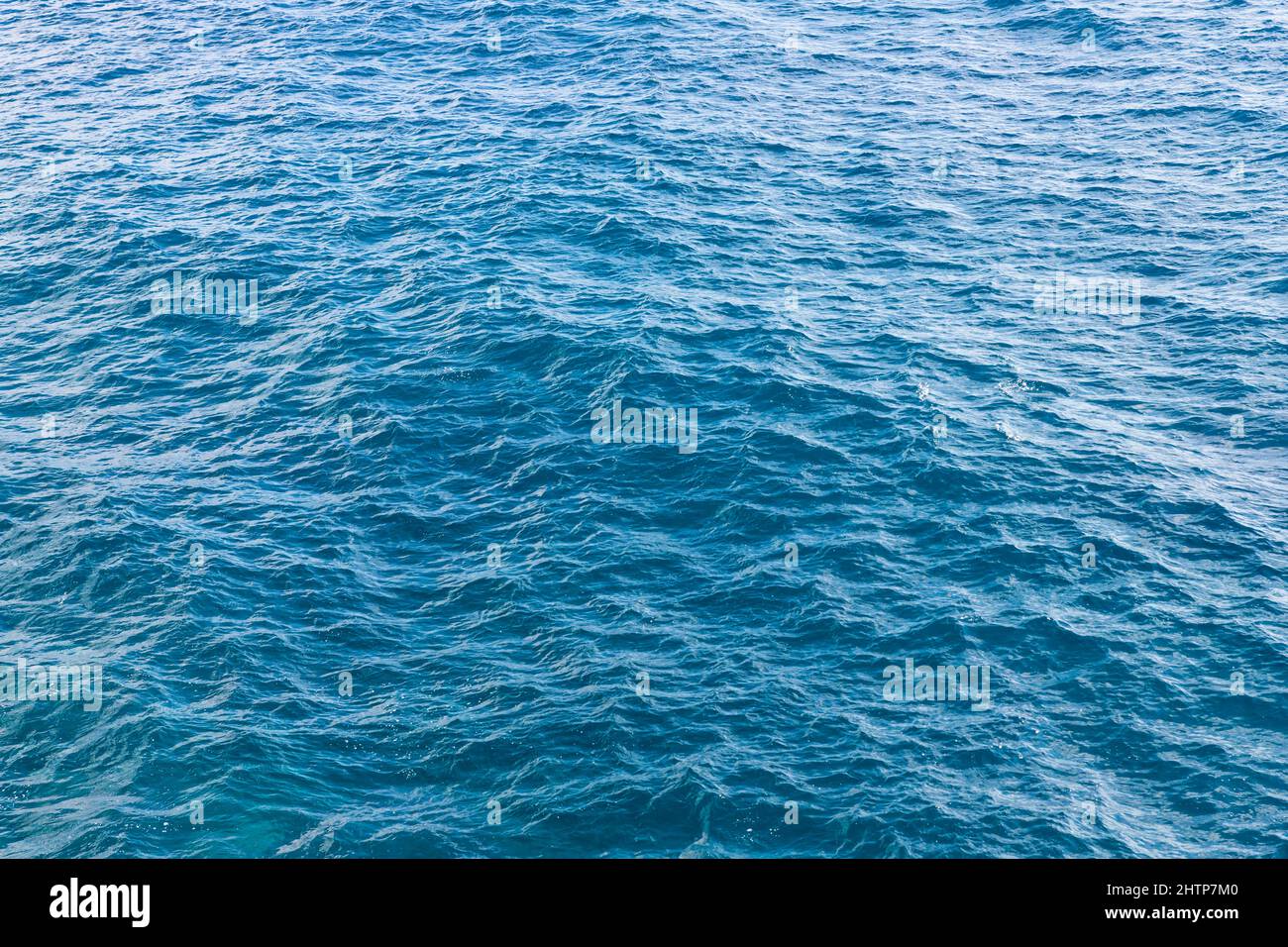 Blue water surface with small waves at sea Stock Photo - Alamy