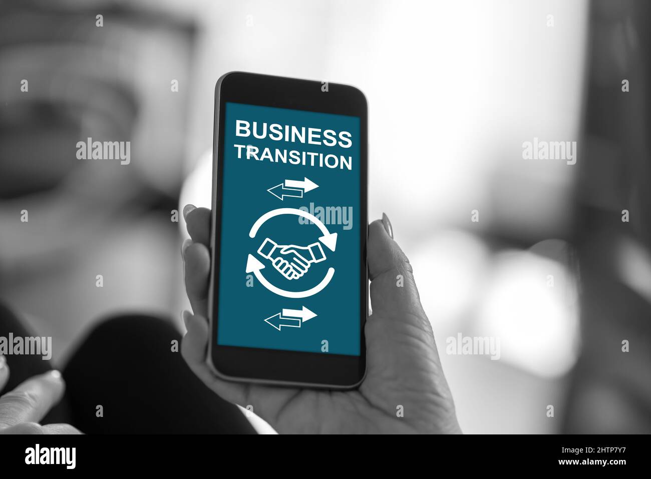 Smartphone screen displaying a business transition concept Stock Photo ...