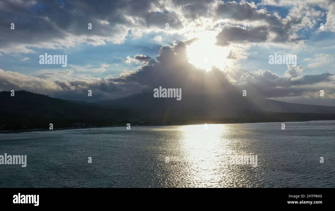 Sunset over Gunung Agung on Bali, Amed, Indonesia Stock Photo - Alamy