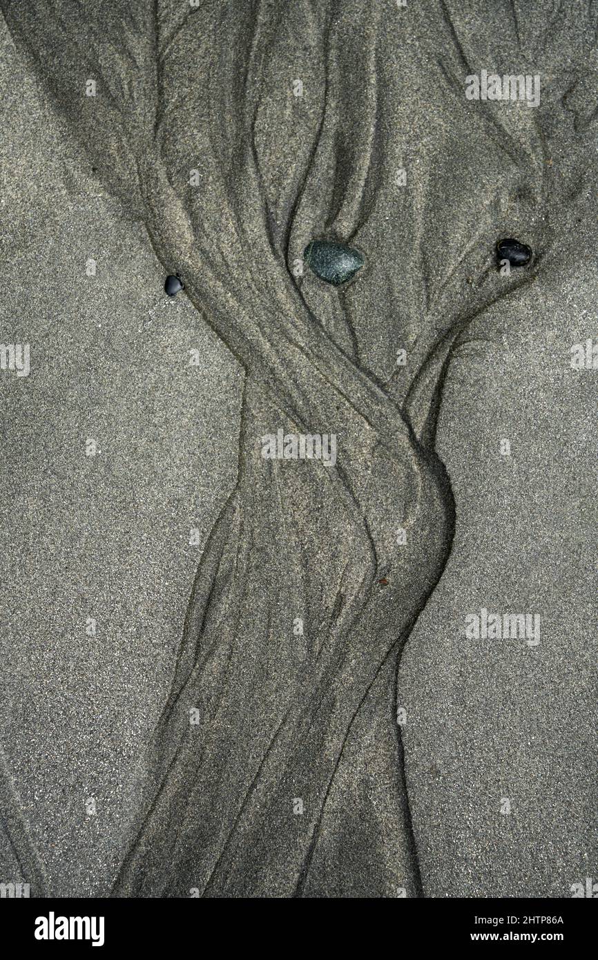 Abstract patterns in ocean beach sand Stock Photo - Alamy