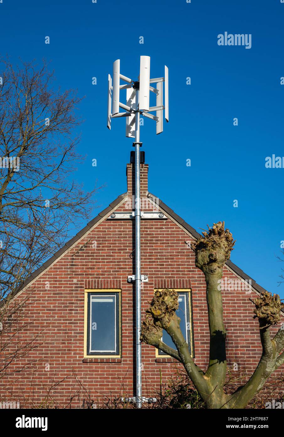Small power generator for homes, vertical axis wind turbine mounted on ...