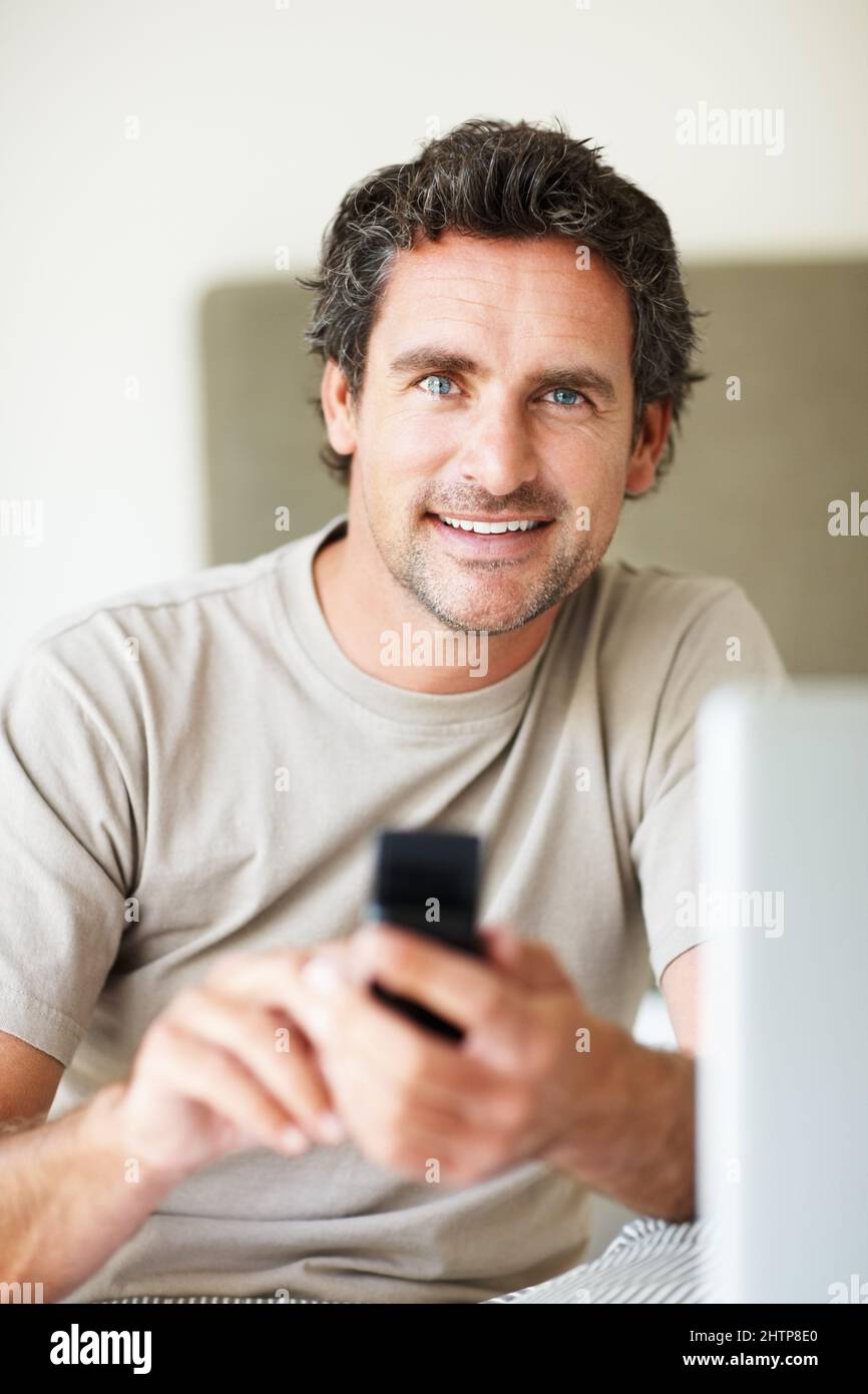 Smart Man Holding Cell Phone Portrait Of Handsome Man Sending Text